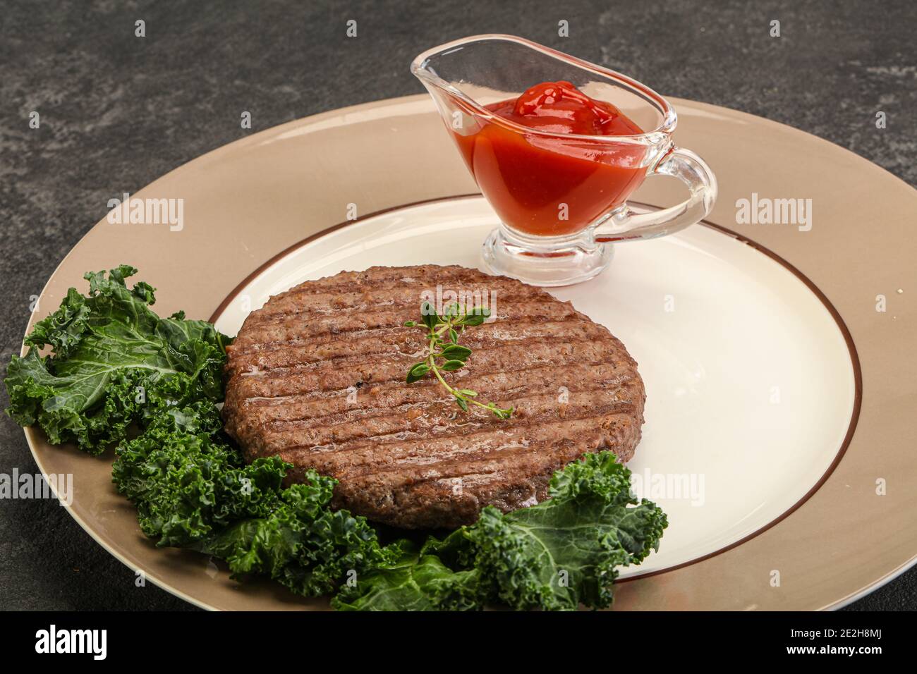 Grilled tasty beef cutlet for burger Stock Photo - Alamy
