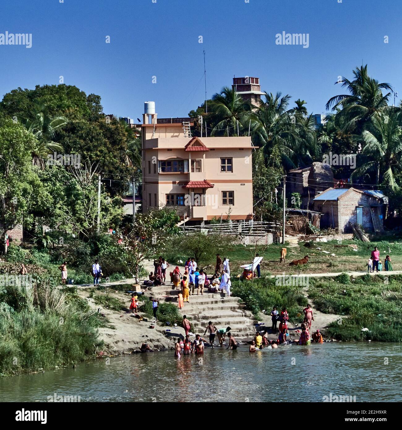 Mayapur, West Bengal, India. Typical atmosphere in the city near a ghat ...