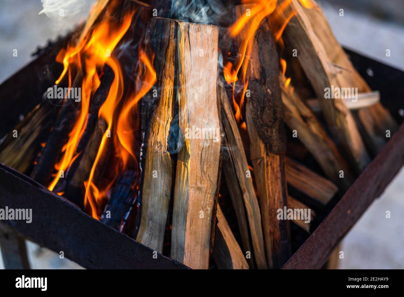 Burning wood chips to form coal. Barbecue preparation, fire before ...