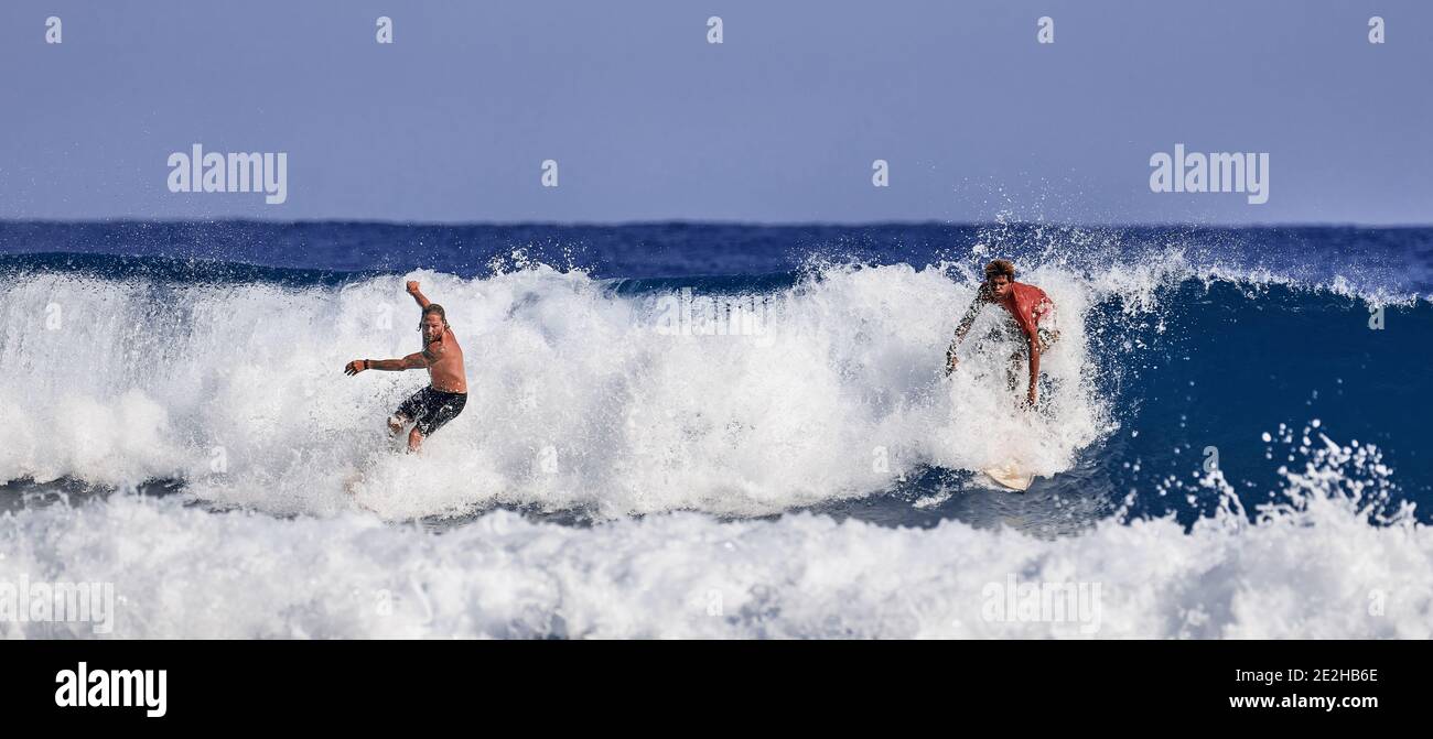 Professional surfer on the wave. Water sports activities. Atlantic ...