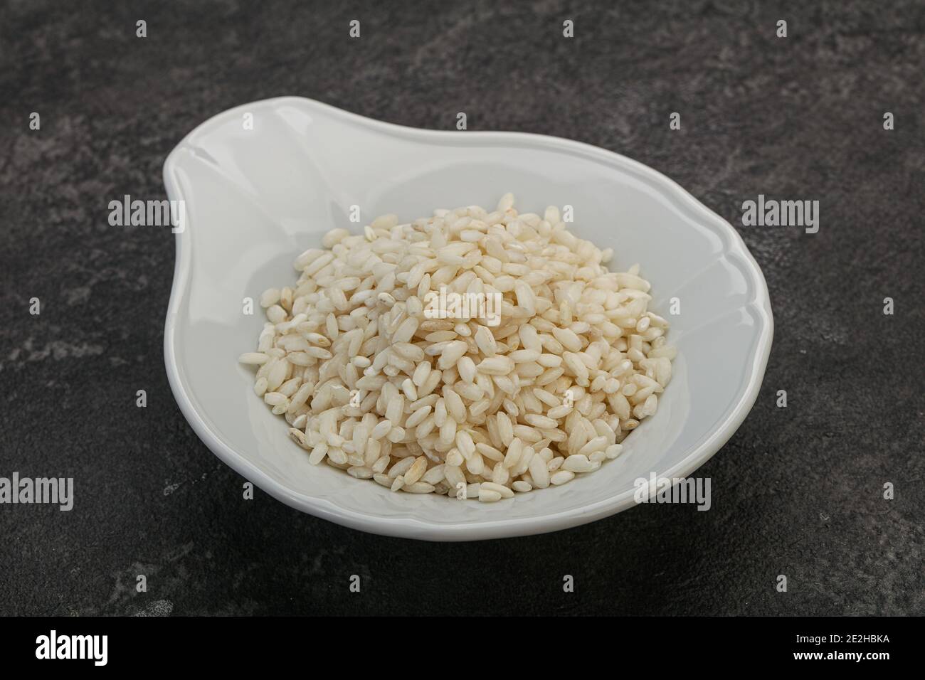 Raw Italian arborio rice for Risotto Stock Photo - Alamy