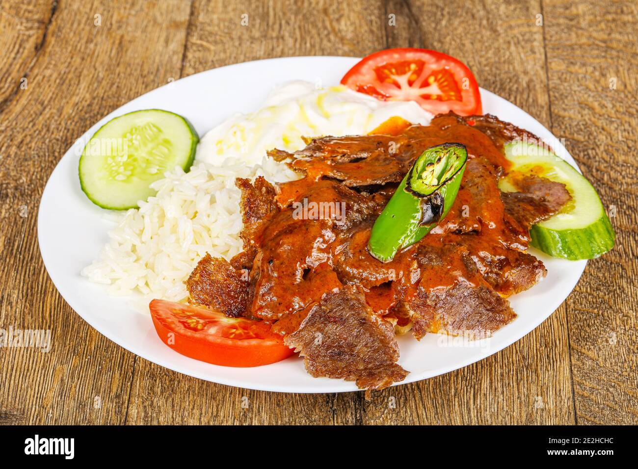 Turkish cuisine - Iskander kebab grilled meat with sauce Stock Photo ...