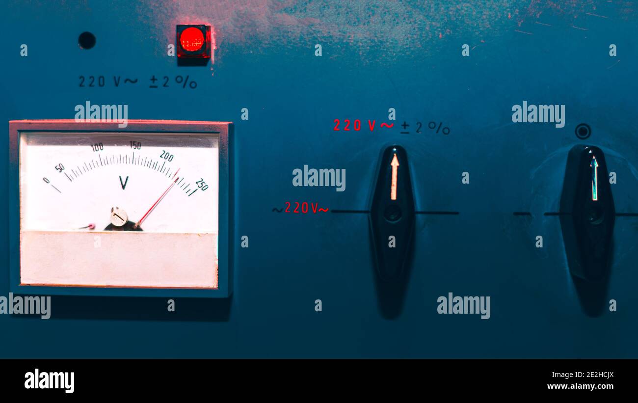 Electrical panel surface . Voltmeter and toggle switches Stock Photo ...