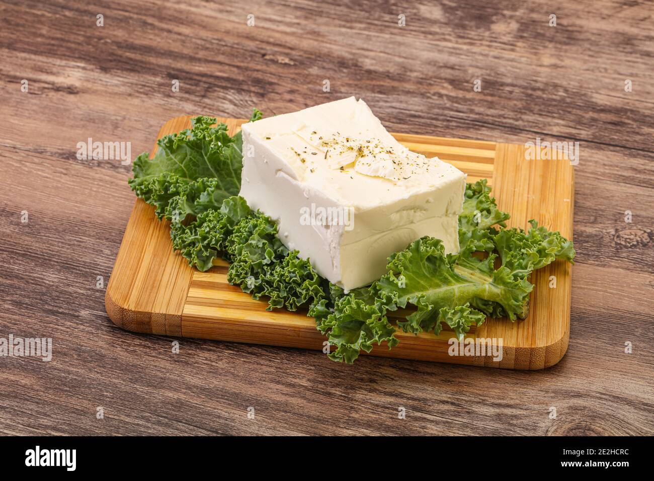 Traditional tasty Greek Feta soft cheese brick Stock Photo - Alamy