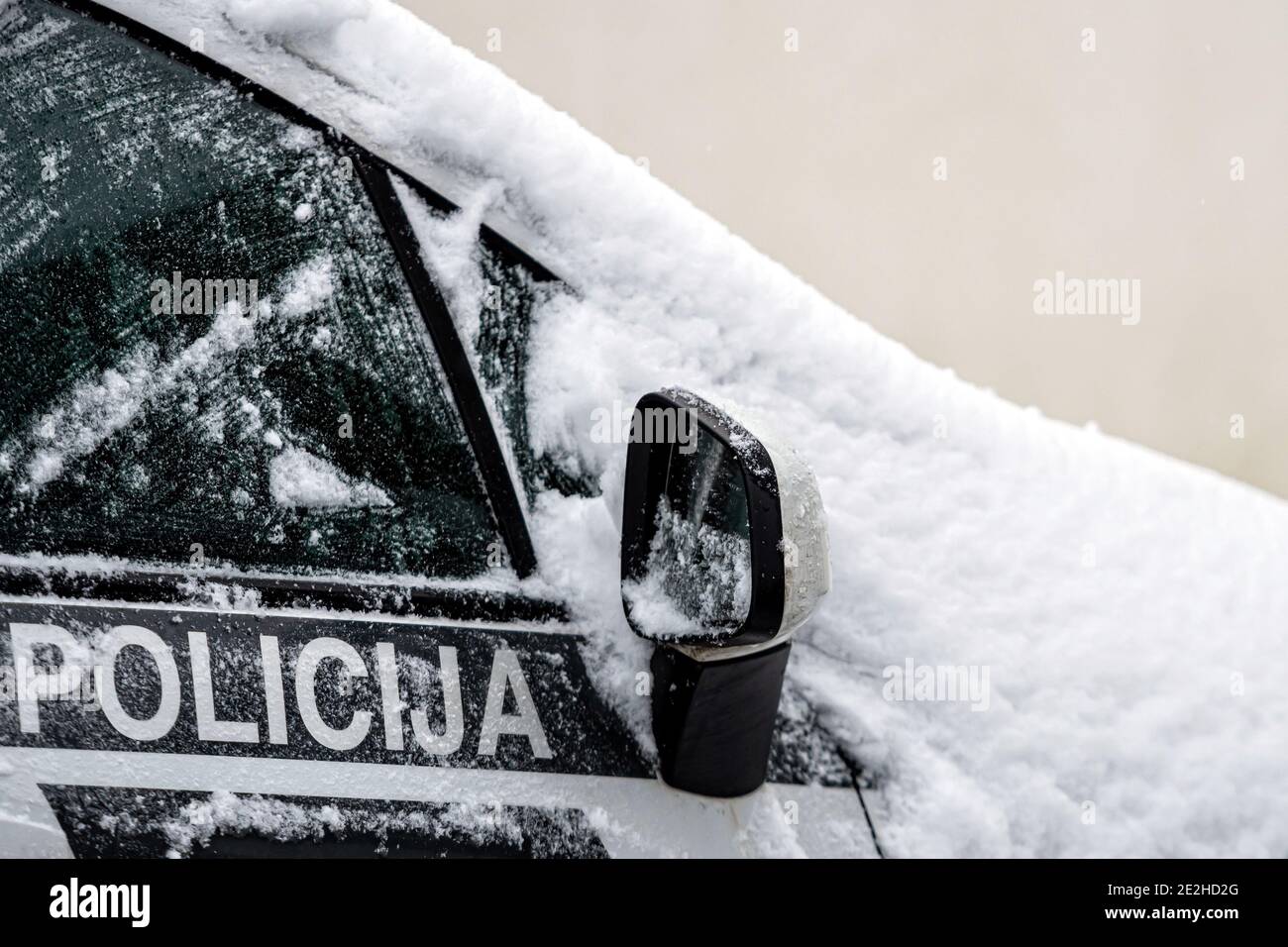 snow-covered police car in the parking lot, Riga, Latvia Stock Photo ...