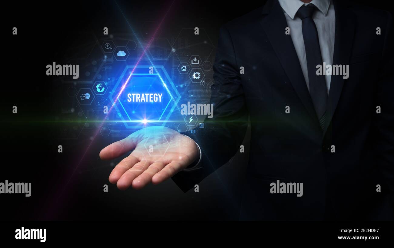 Man hand holding STRATEGY inscription, social media concept Stock Photo ...