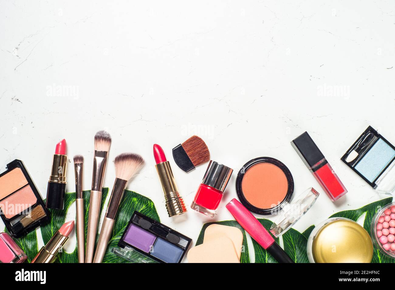 Makeup professional cosmetics on white background Stock Photo - Alamy