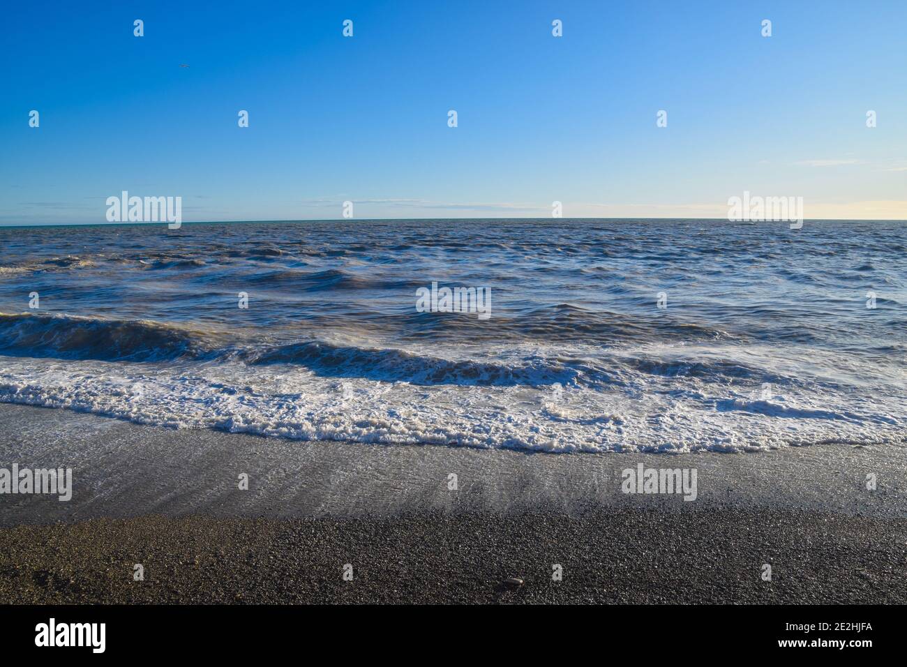 Empty beach and sea view with a clear blue sky, Nice, South of France ...