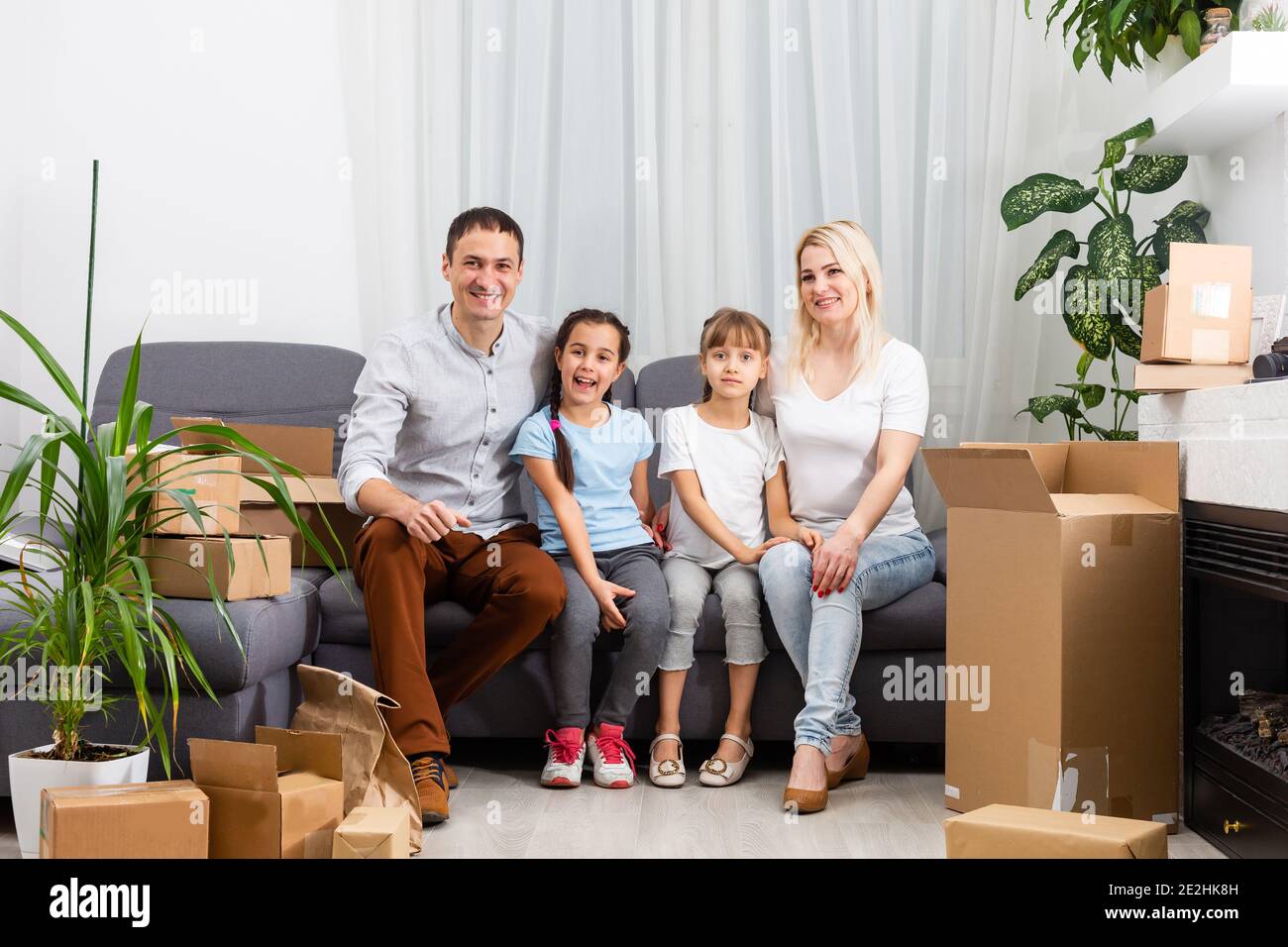 concept housing a young family. mother father and children in a new ...