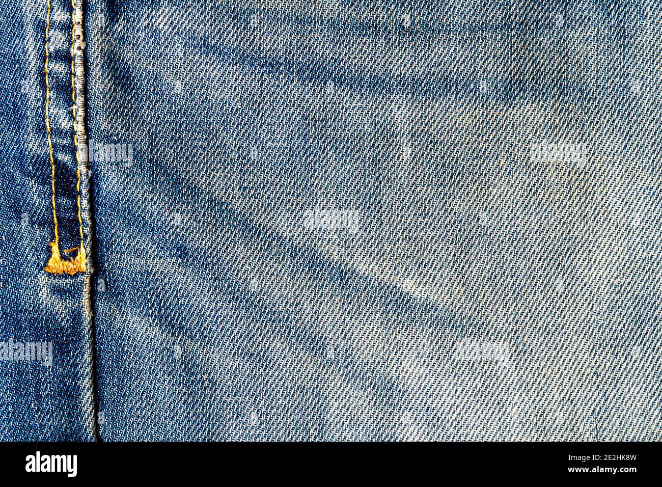 Dark blue jeans texture. Denim fabric background with a seam Stock ...