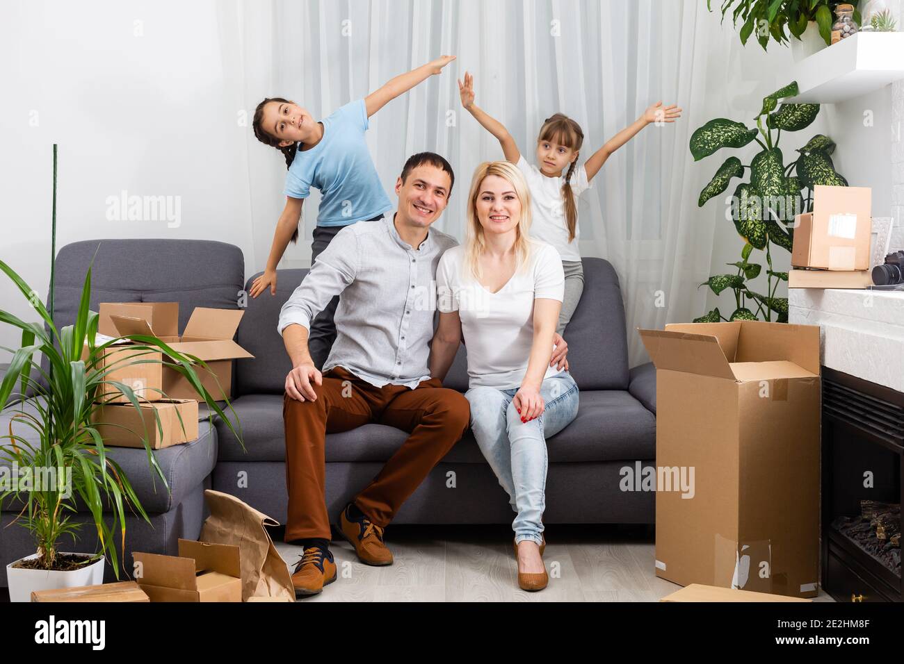 concept housing a young family. mother father and children in a new ...