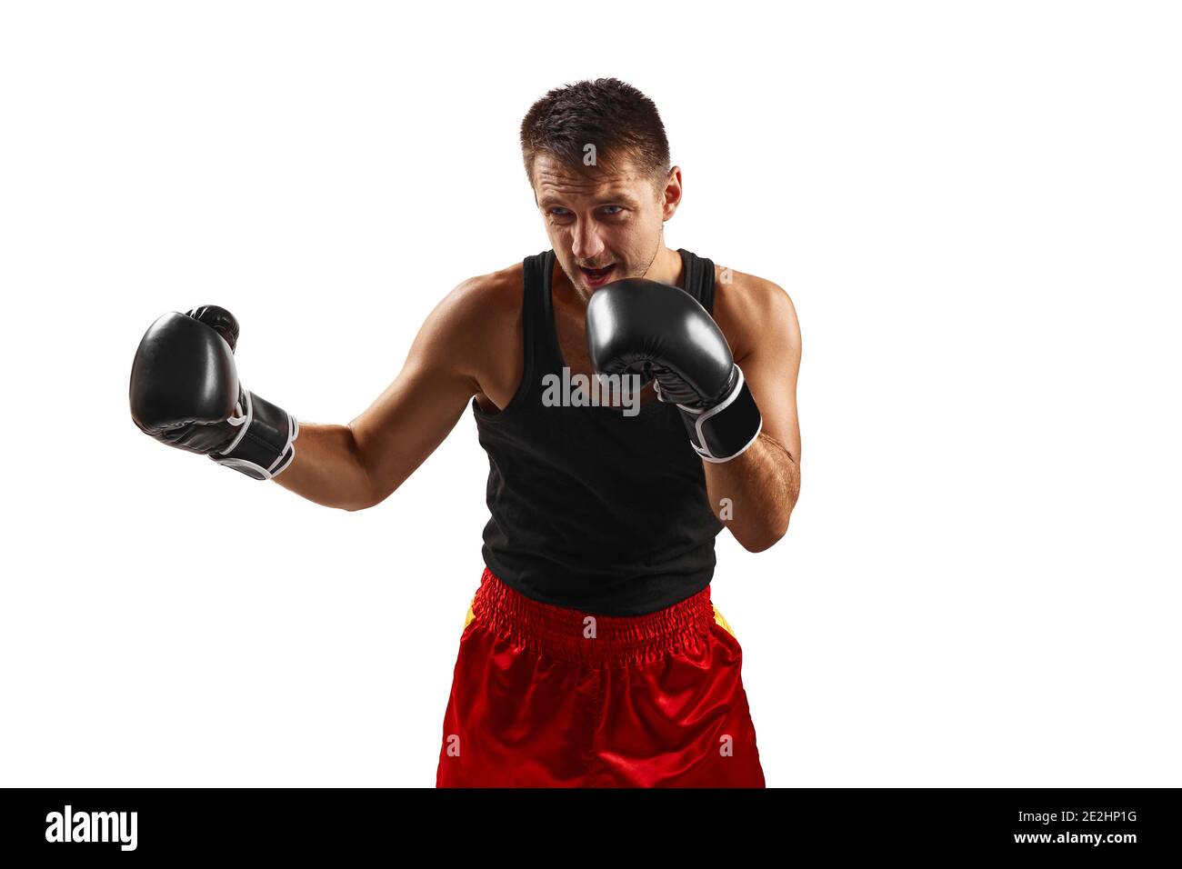 professional boxer man in black boxing gloves punching isolated on ...