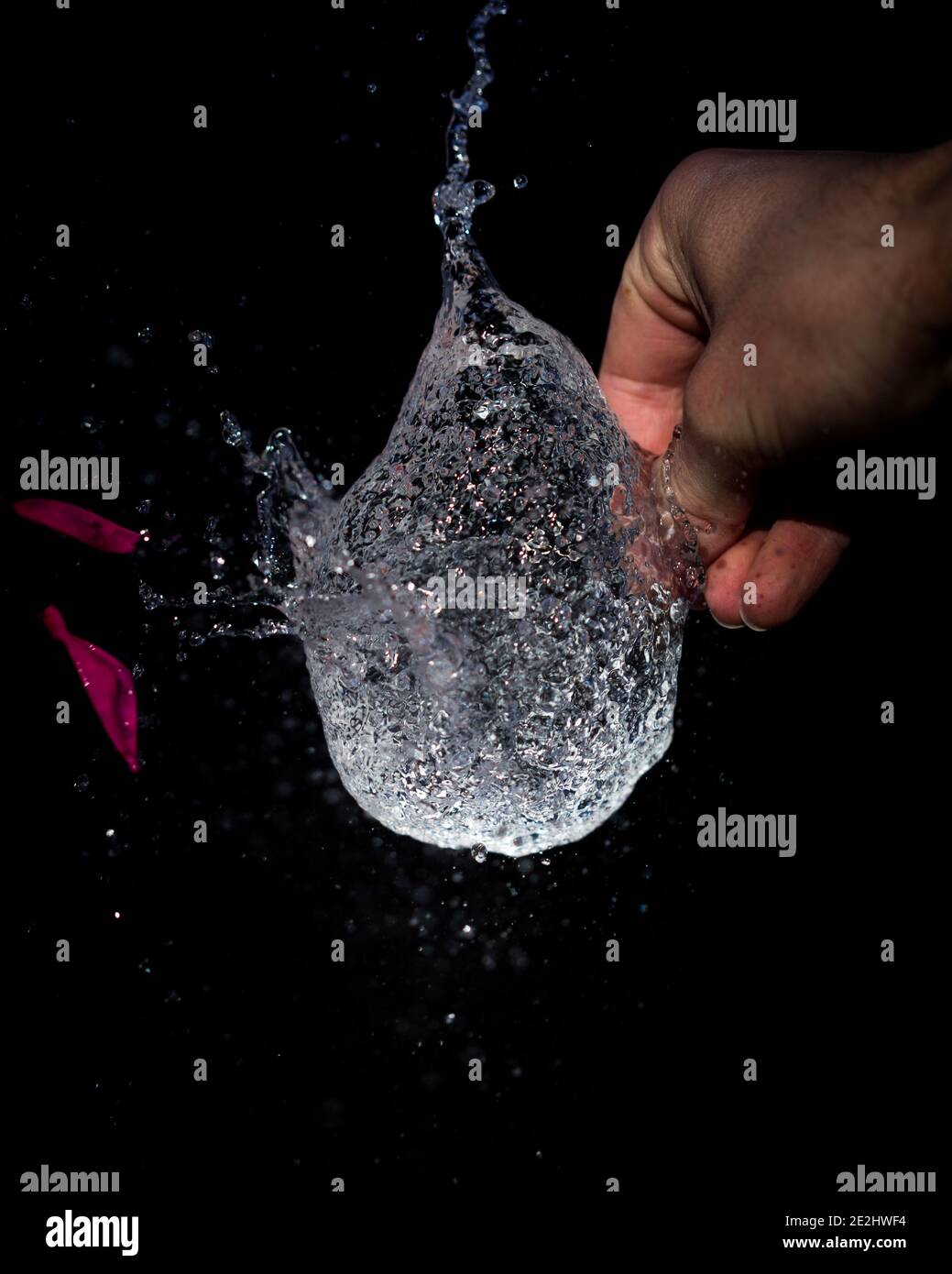 Popped water balloon hi-res stock photography and images - Alamy