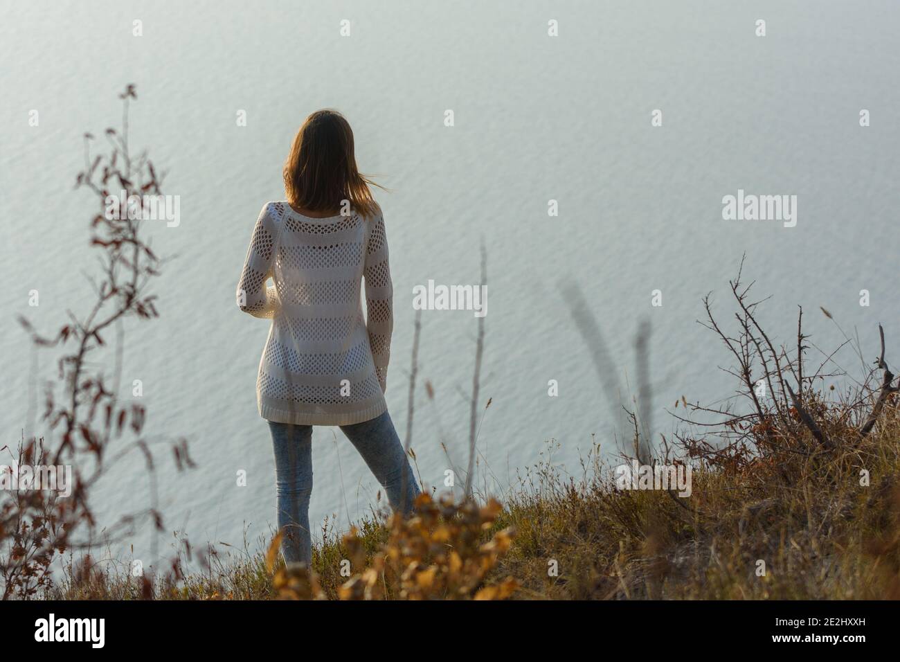 Beautiful girl stands looks hi-res stock photography and images - Alamy