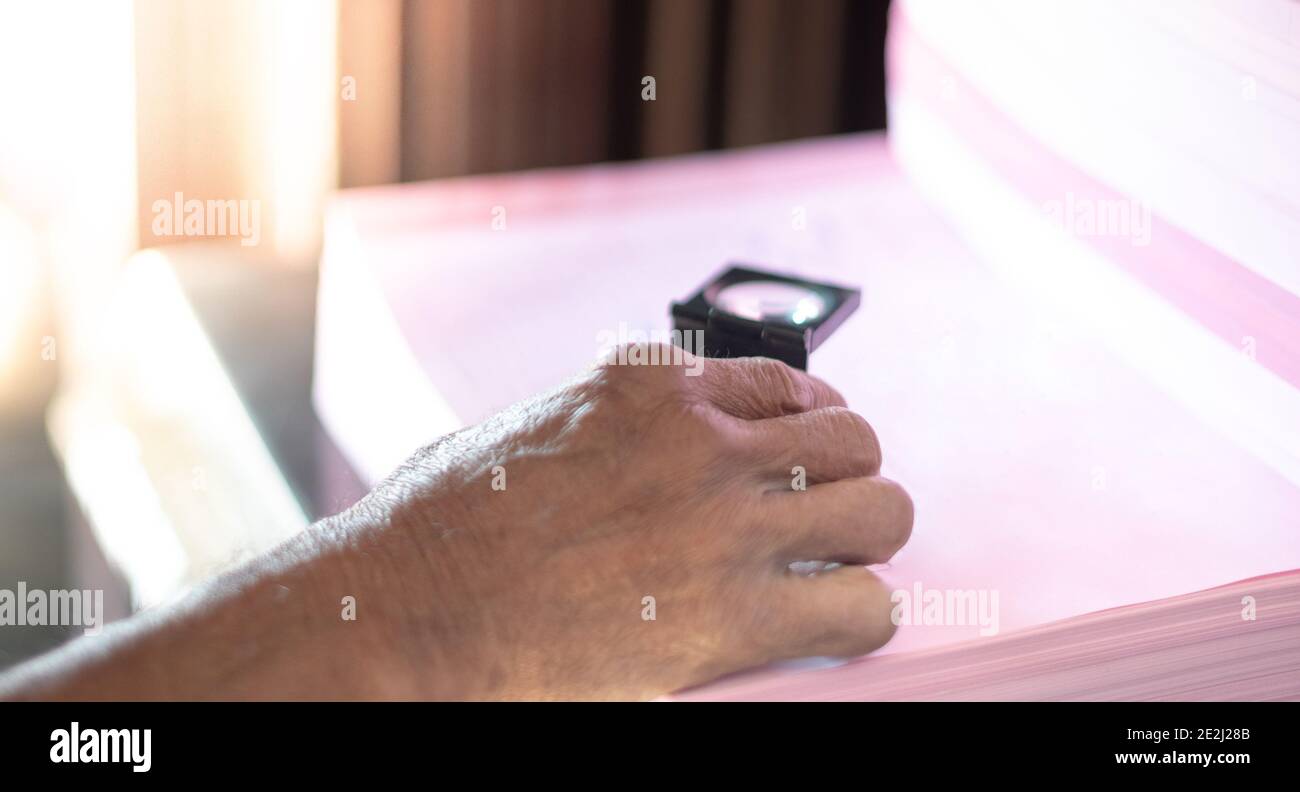 Printing industry magnifying glass hi-res stock photography and images ...