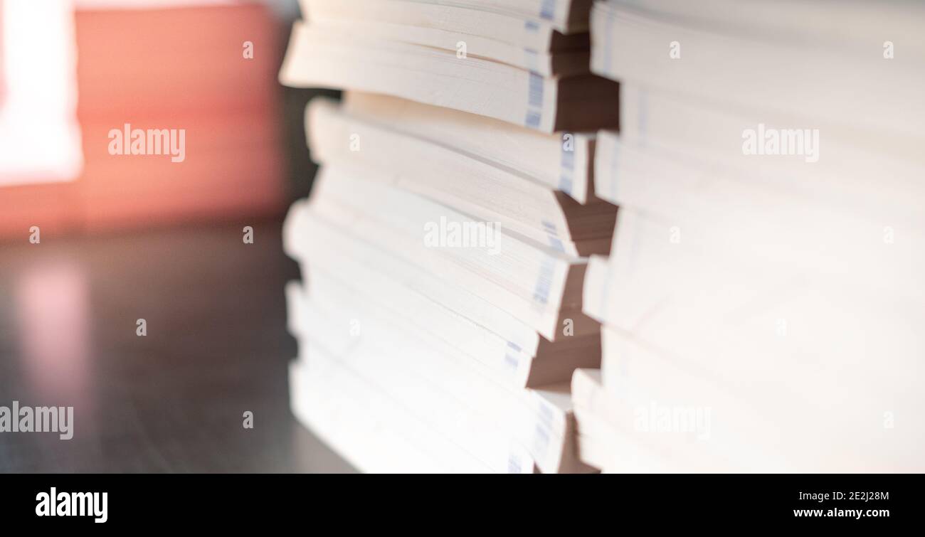 The heap of blank paper preparing for printing process with the ...