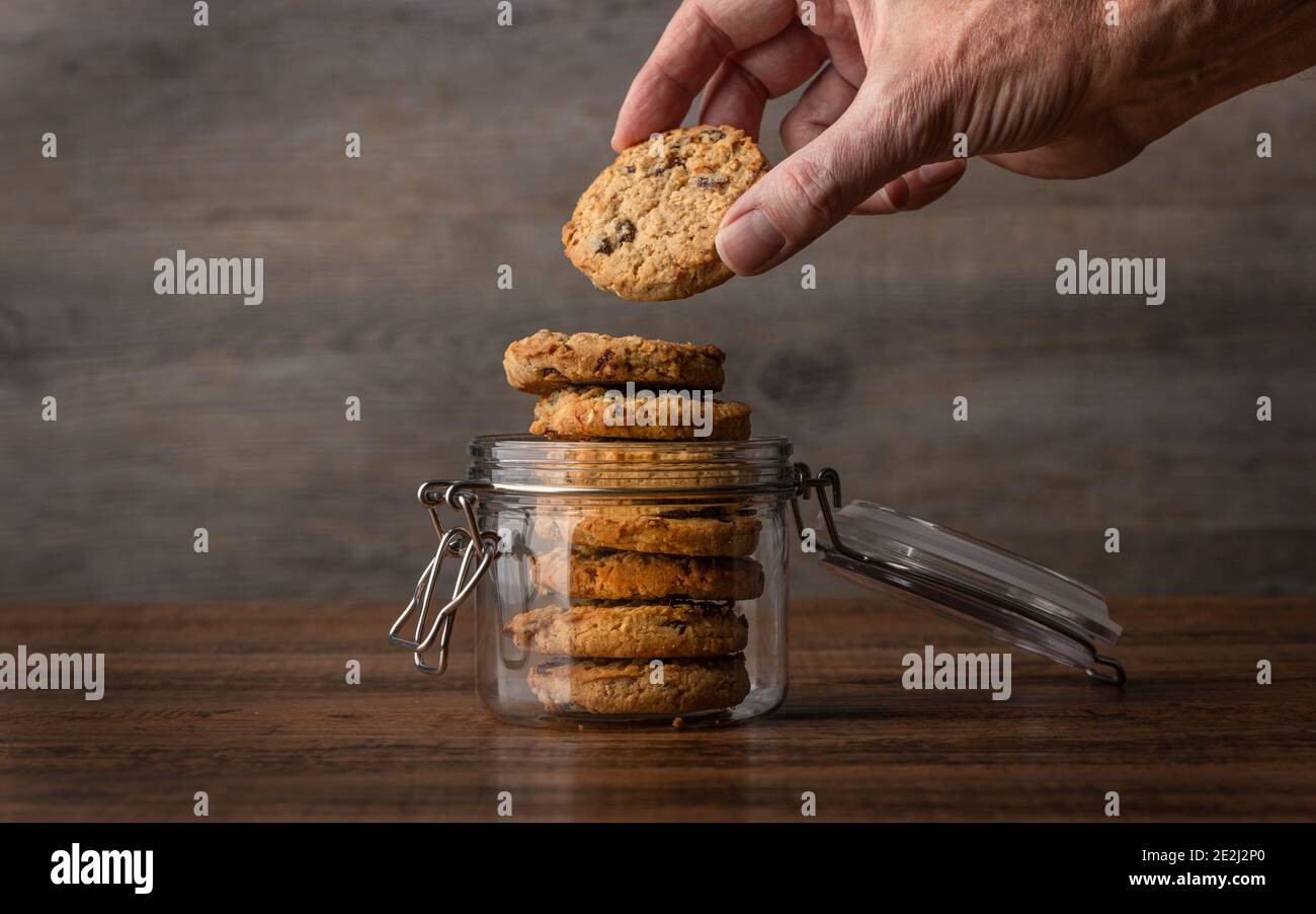 Cookie jar hand hi-res stock photography and images - Alamy