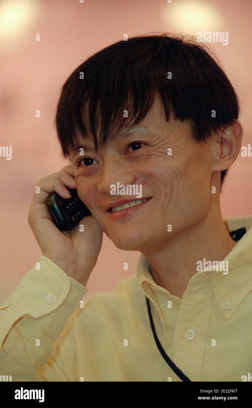 Jack Ma, the co-founder of Alibaba Group, talks on the mobile phone ...