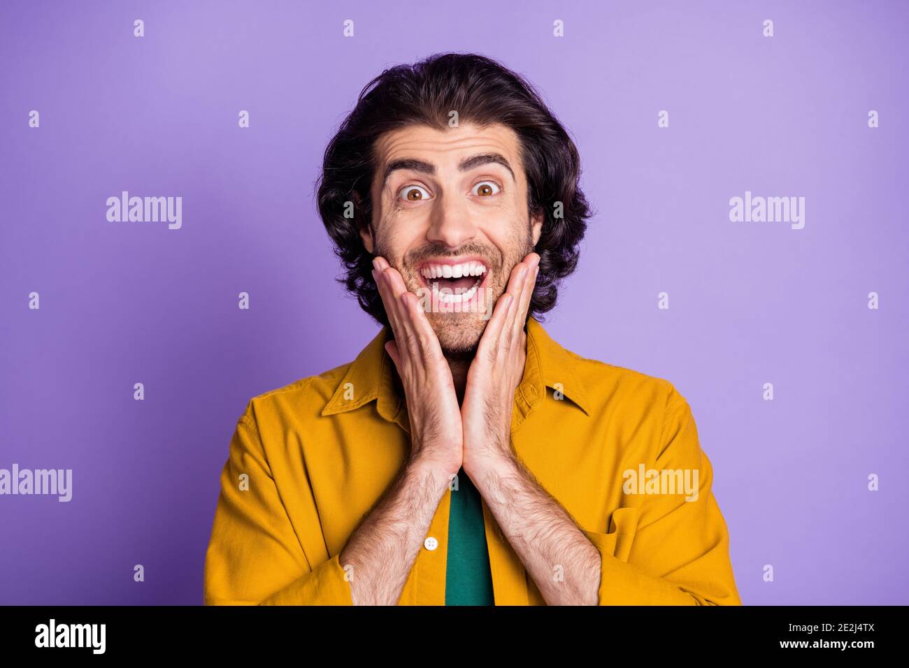 Portrait of young ecstatic amazed happy shocked man guy male scream ...