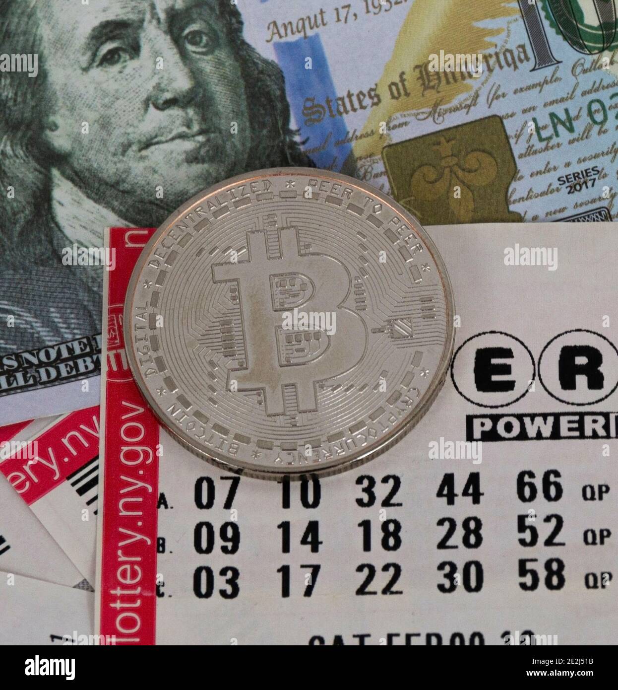 Babylon, New York, USA - 10 January 2021: One silver bitcoin coin on ...