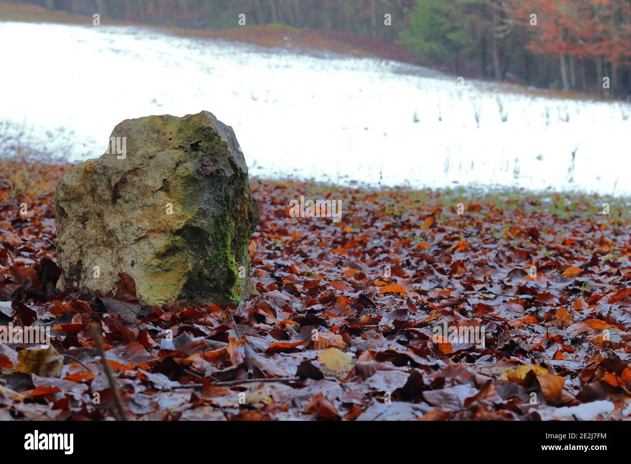 Snow covered rock in foreground hi-res stock photography and images - Alamy