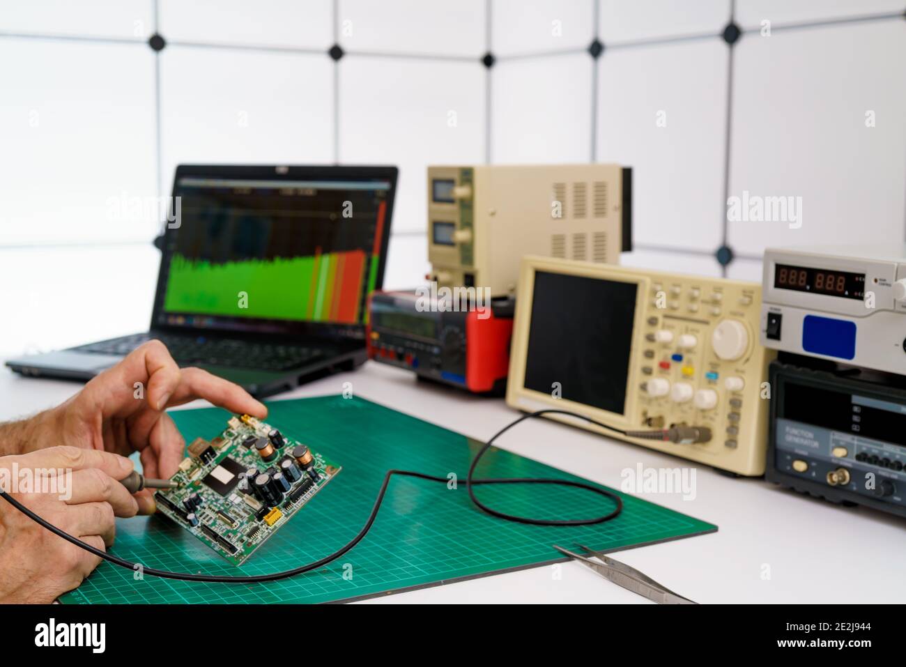 Repair of consumer electronics in the service center Stock Photo - Alamy