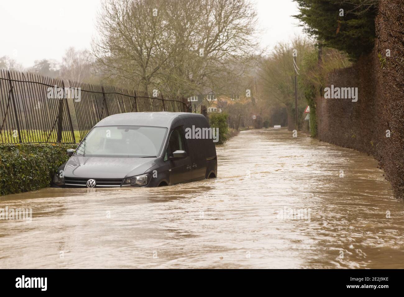 Broken down van in a heavily flooded road Stock Photo - Alamy