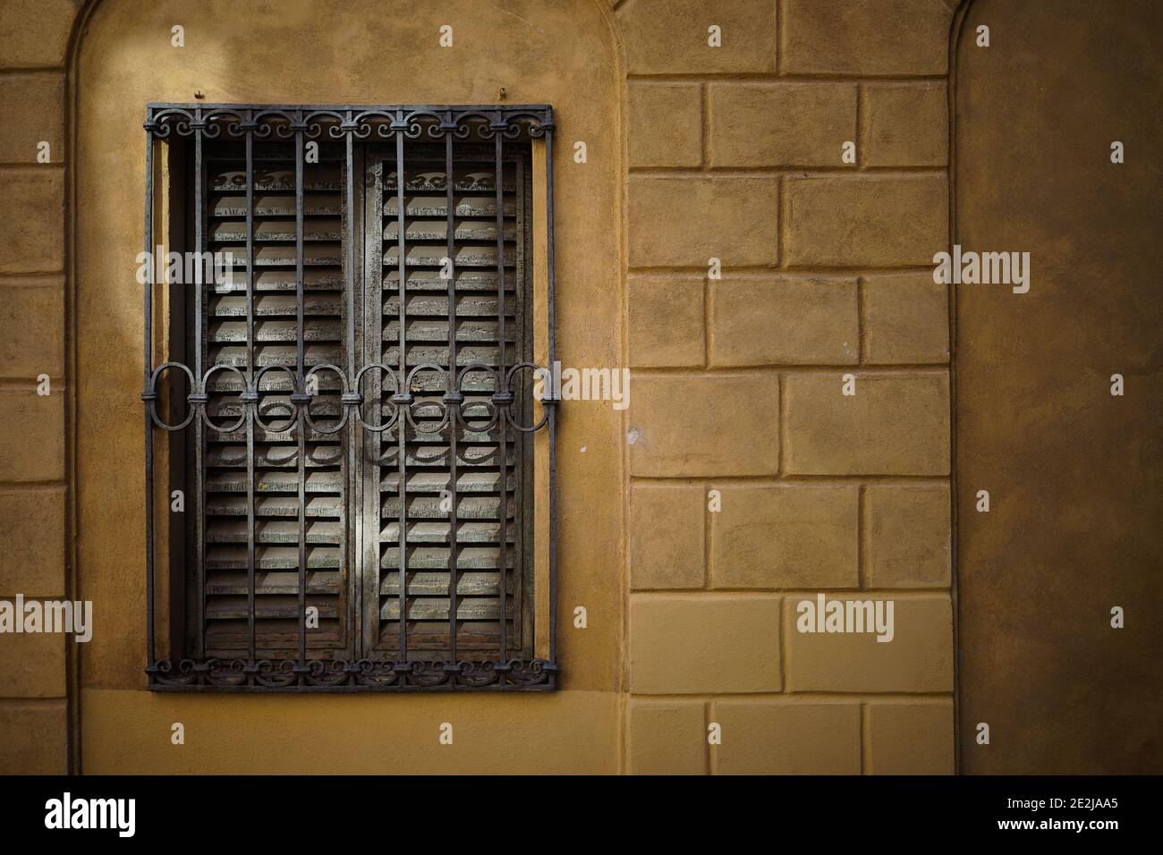 Close-up on a closed window with bars Stock Photo - Alamy