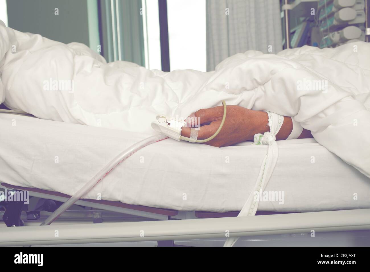 Suffering patient in the intensive care unit Stock Photo - Alamy