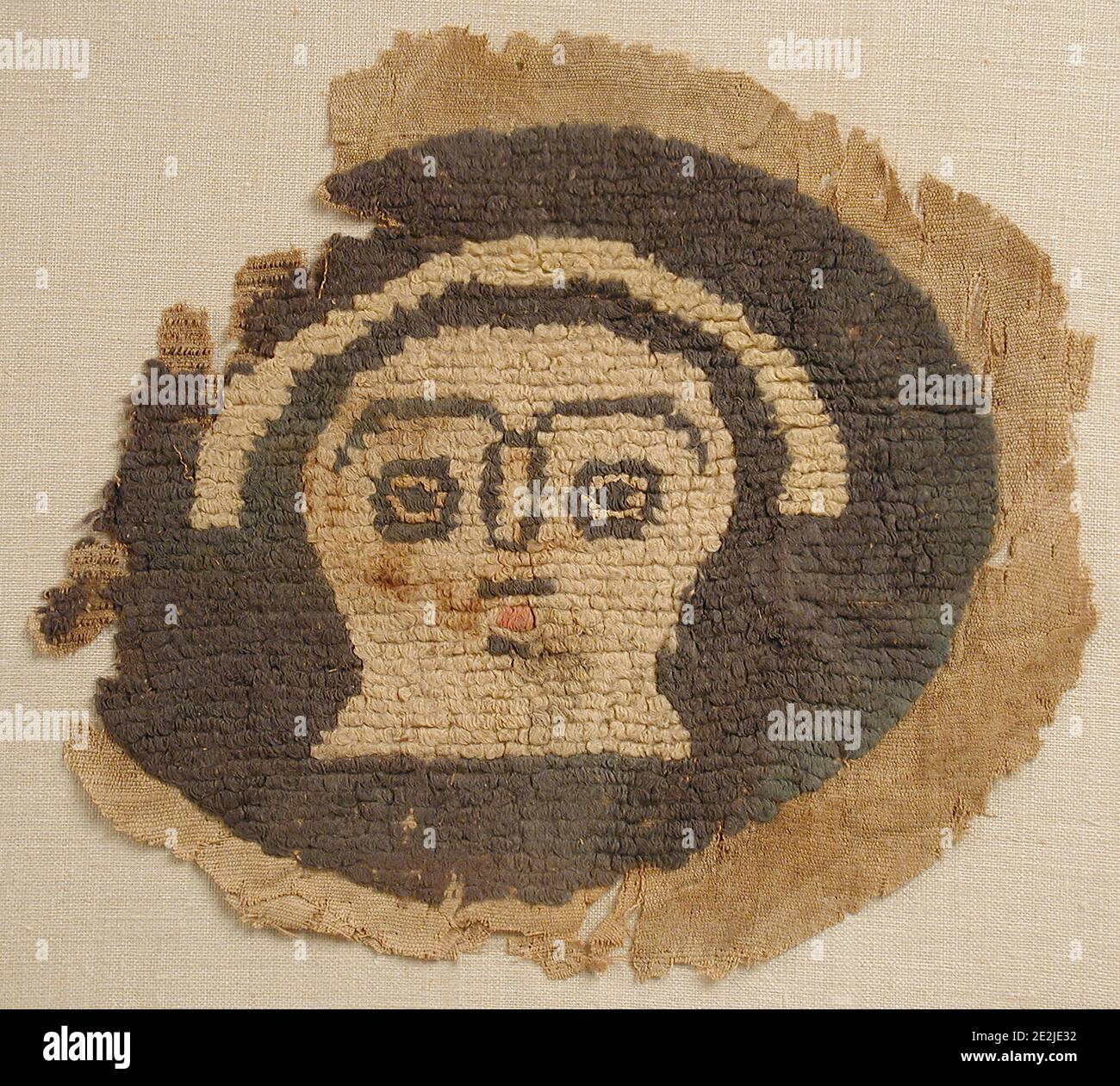 Roundel with Human Face, Coptic, 5th century Stock Photo - Alamy