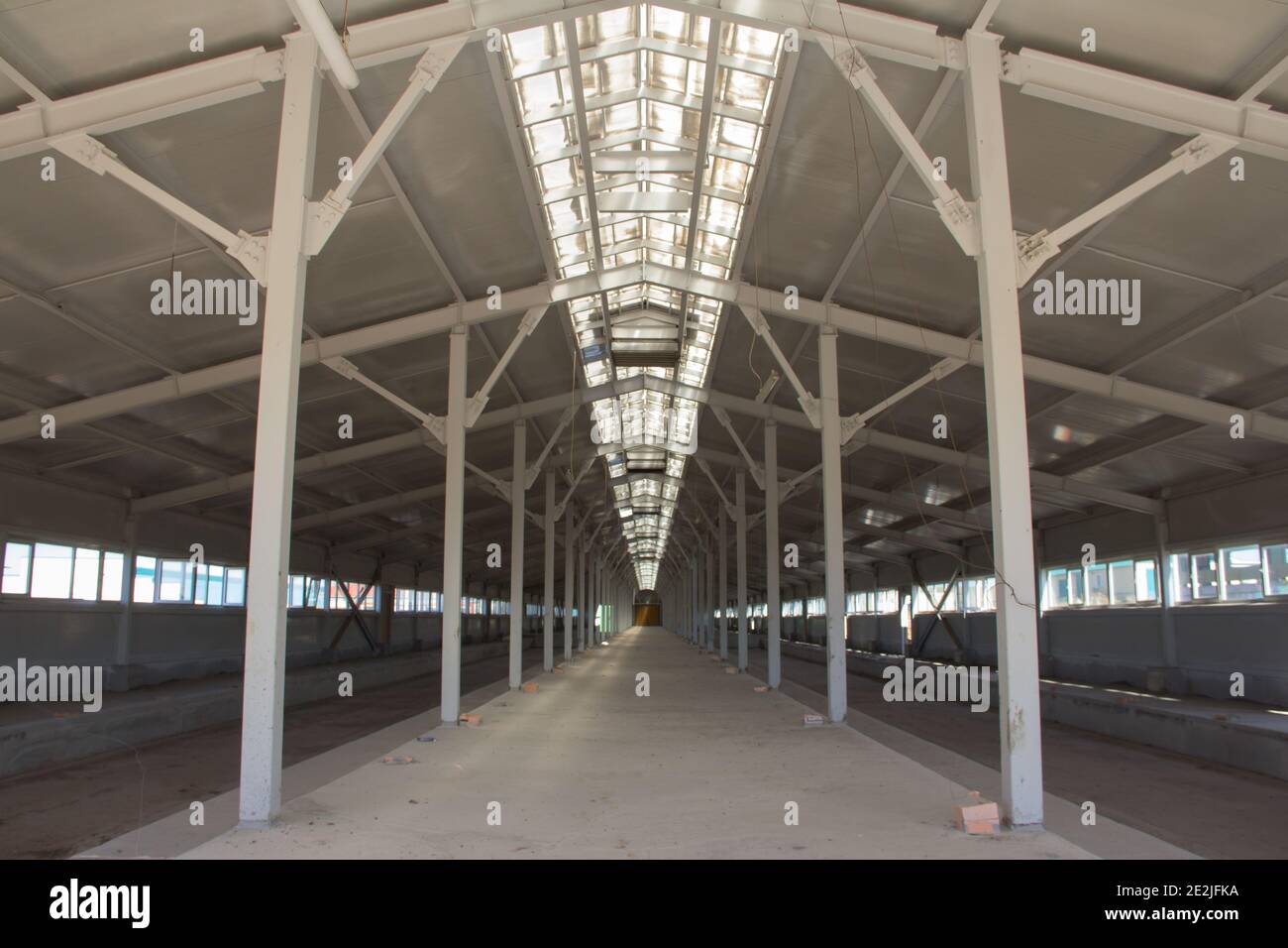Inside the production building under construction. Metal frame of the ...