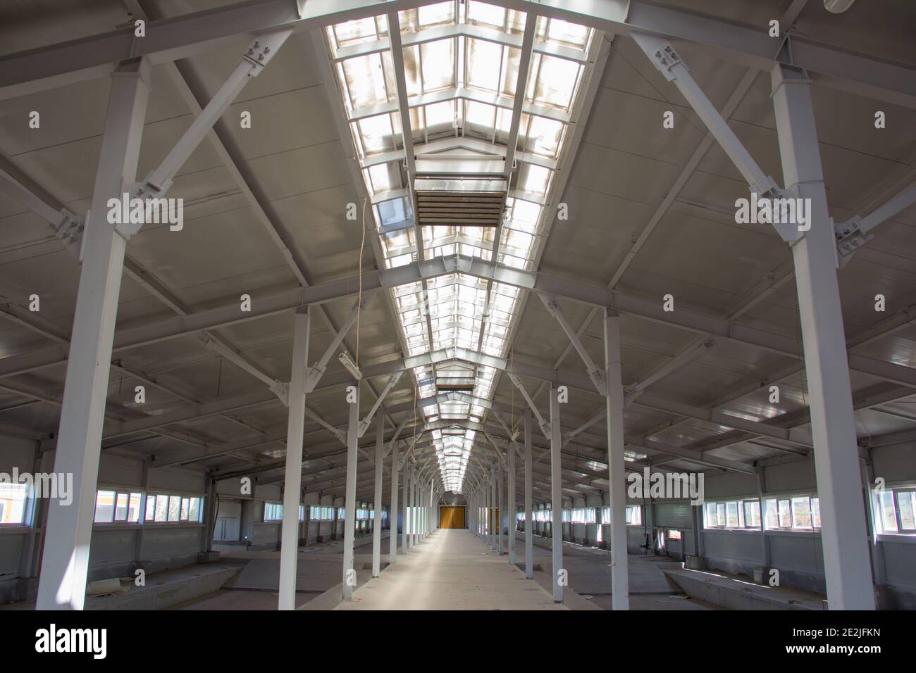 Inside the production building under construction. Metal frame of the ...