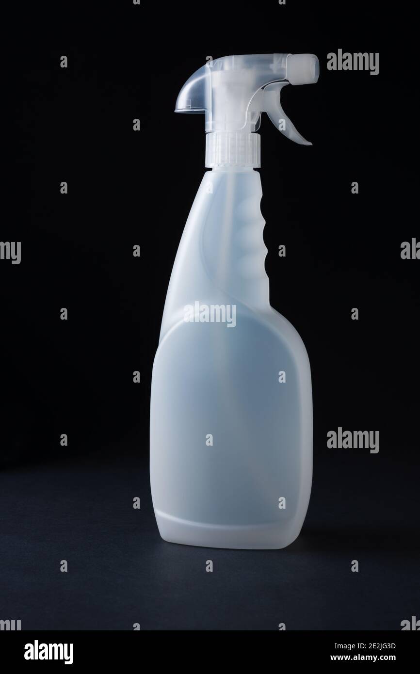 Reusable plastic trigger spray bottle which can be refilled with ...