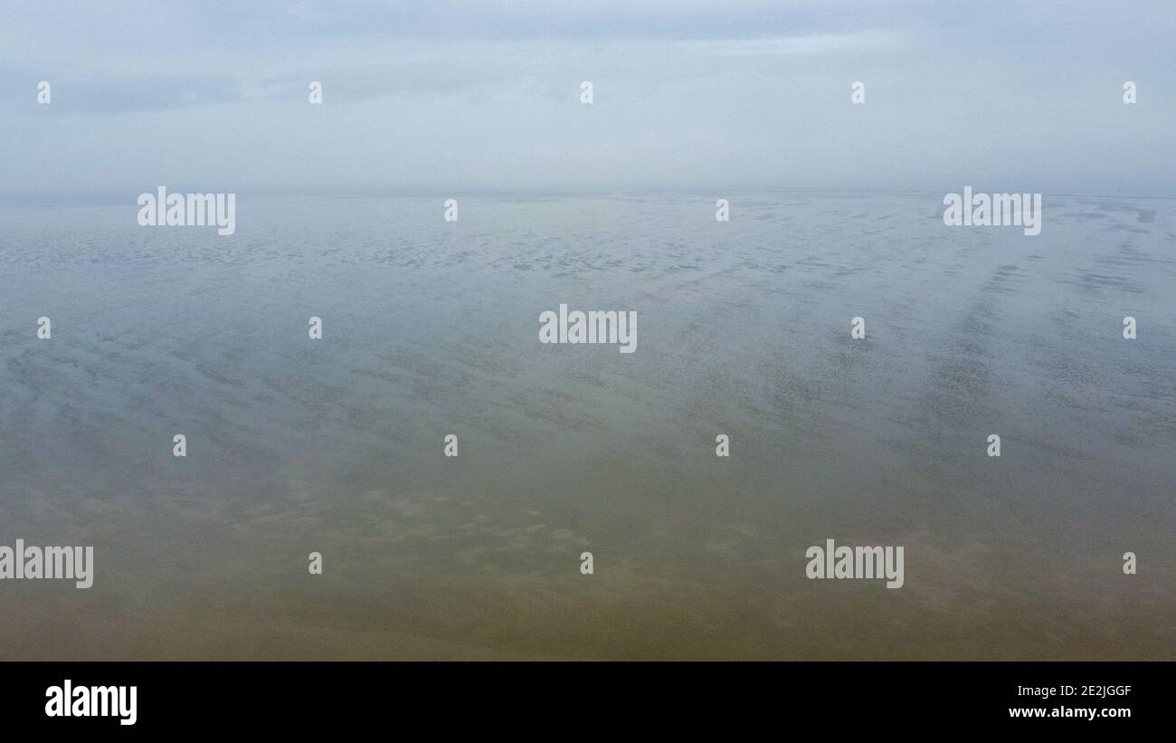 Wadden sea at low tide on amrum island hi-res stock photography and ...