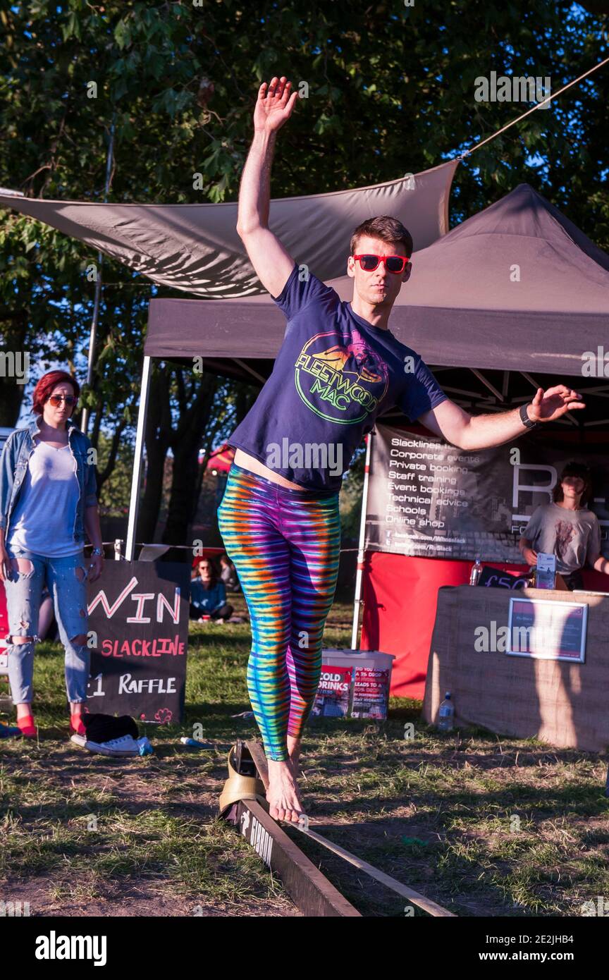 Festival goer walks a tight rope at Citadel Festival, Victoria Park ...