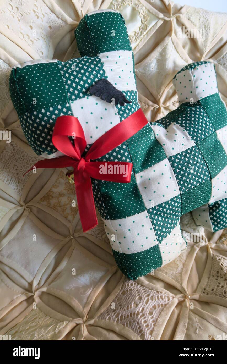 Handmade Patchwork dog stuffed animal on a vintage quilt, USA Stock ...