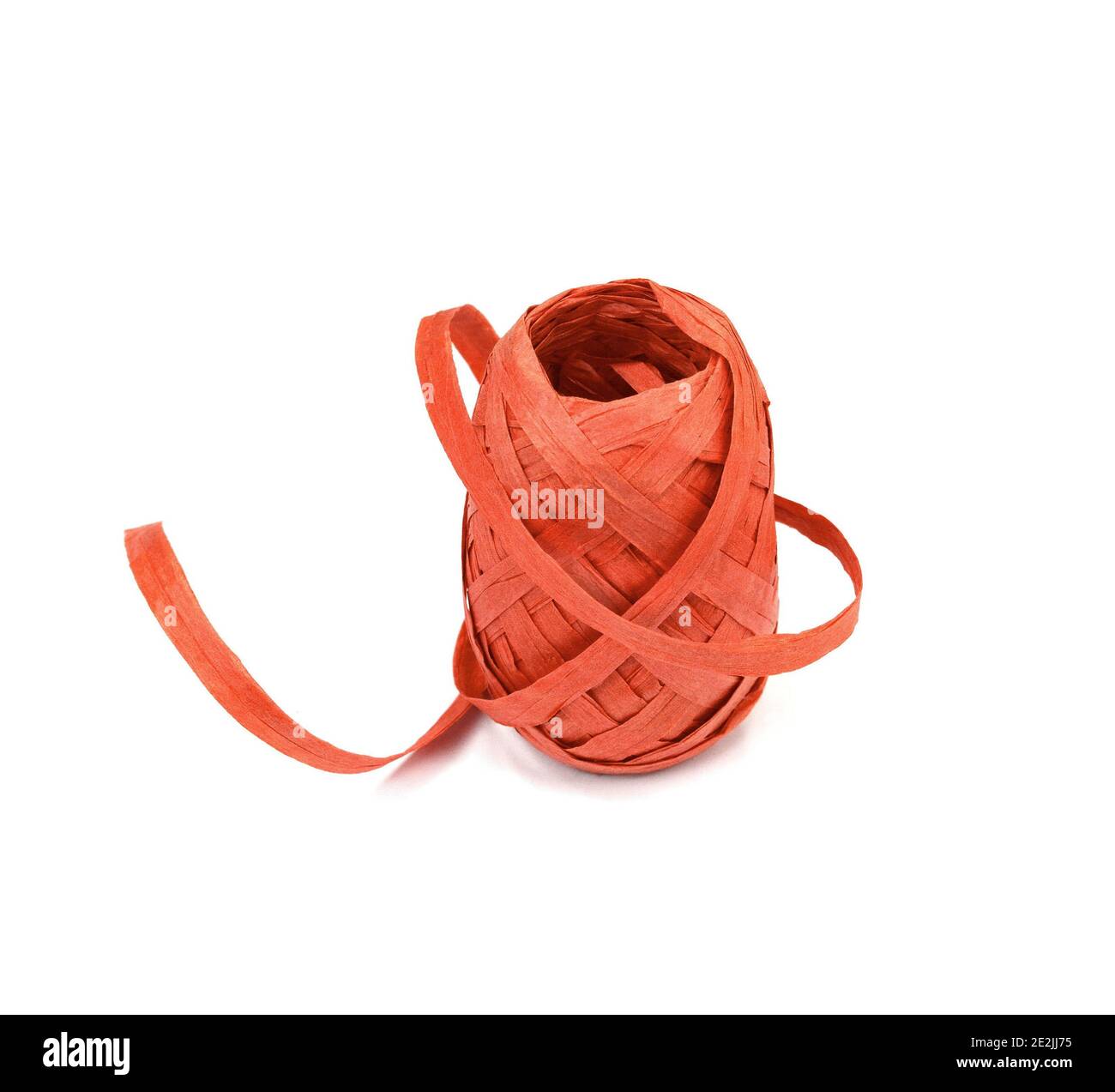 Paper Red ribbon roll isolated on white background Stock Photo - Alamy