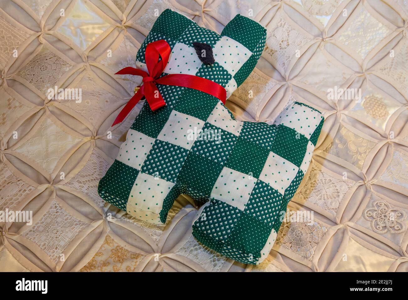 Handmade Patchwork dog stuffed animal on a vintage quilt, USA Stock ...