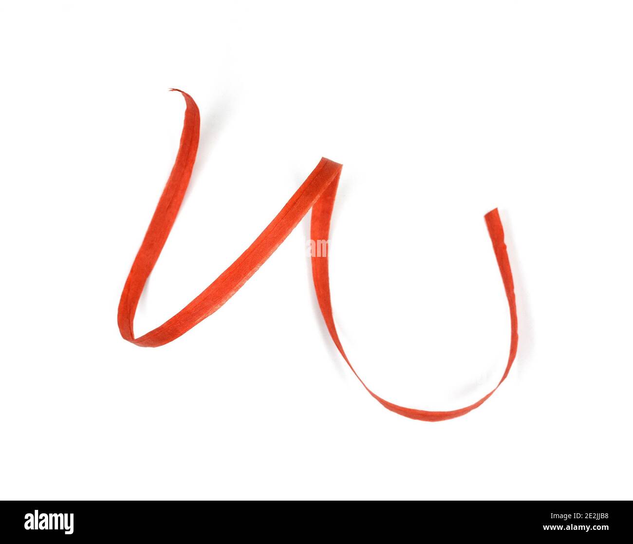 Paper Red ribbon roll isolated on white background Stock Photo - Alamy