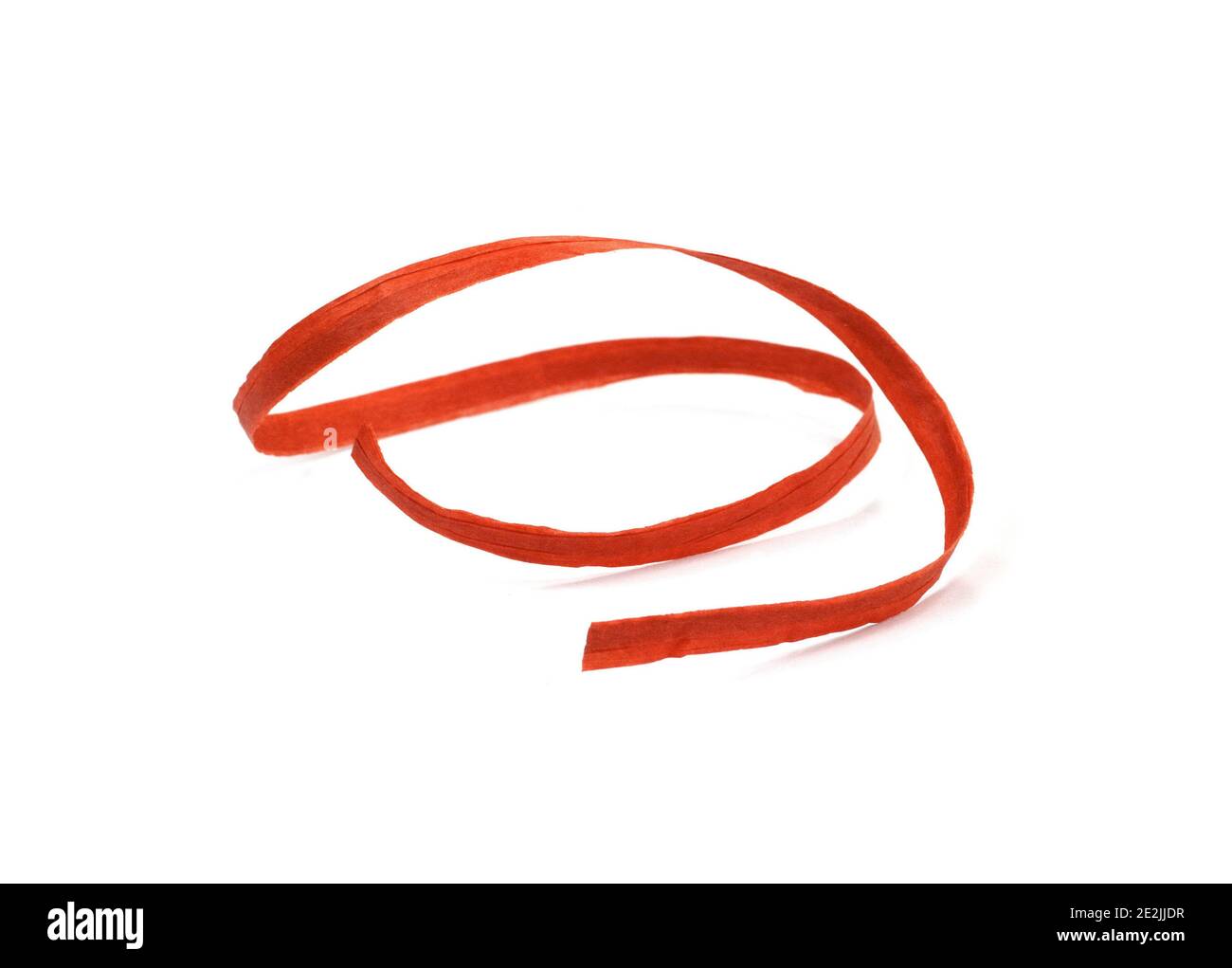 Paper Red ribbon roll isolated on white background Stock Photo - Alamy