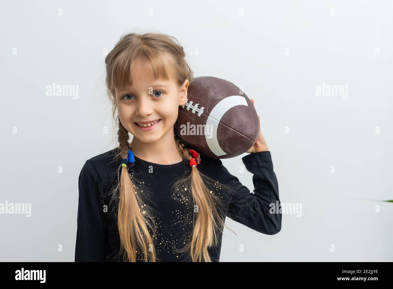 Kids rugby holding hi-res stock photography and images - Alamy