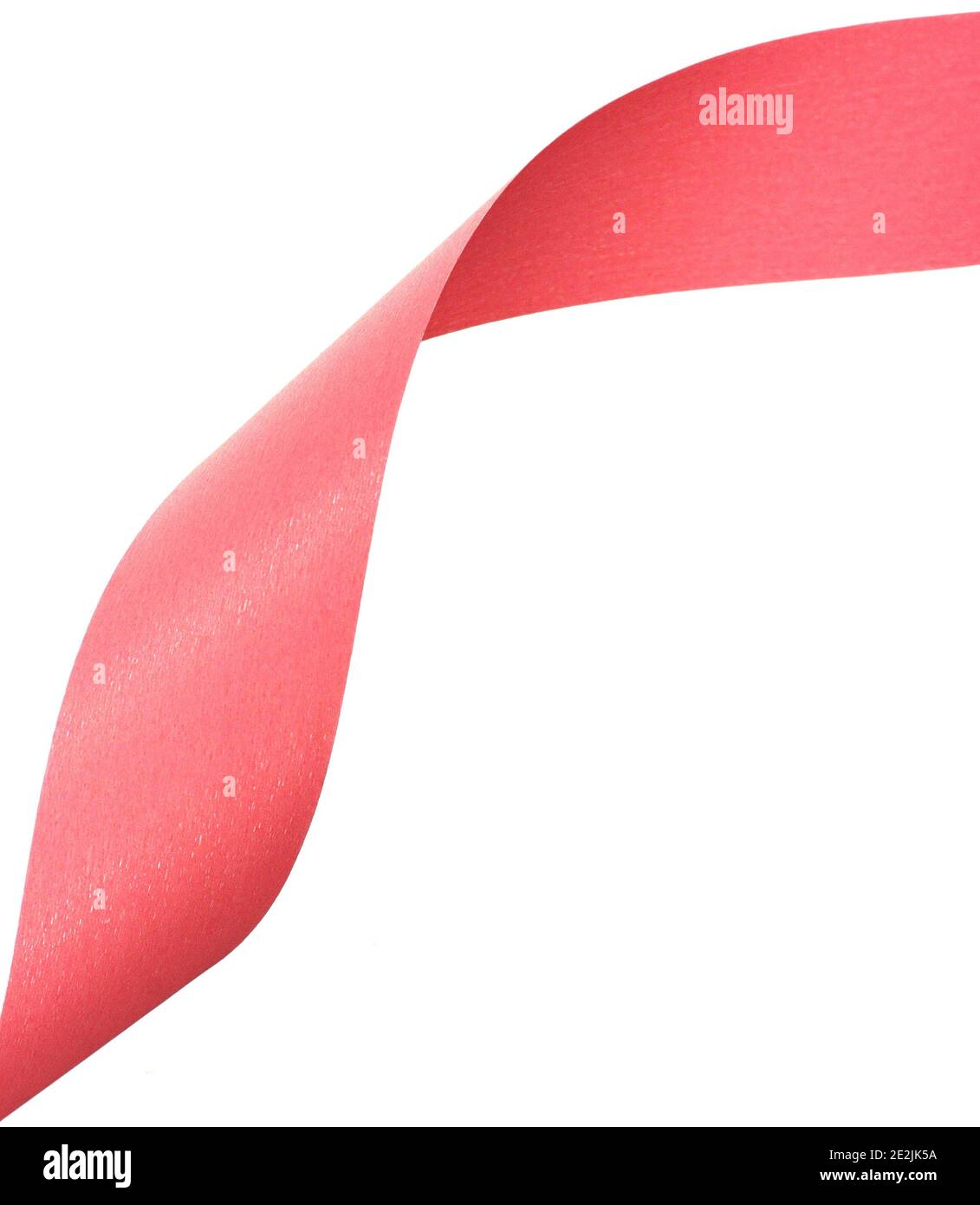 Red ribbon roll isolated on white background Stock Photo - Alamy