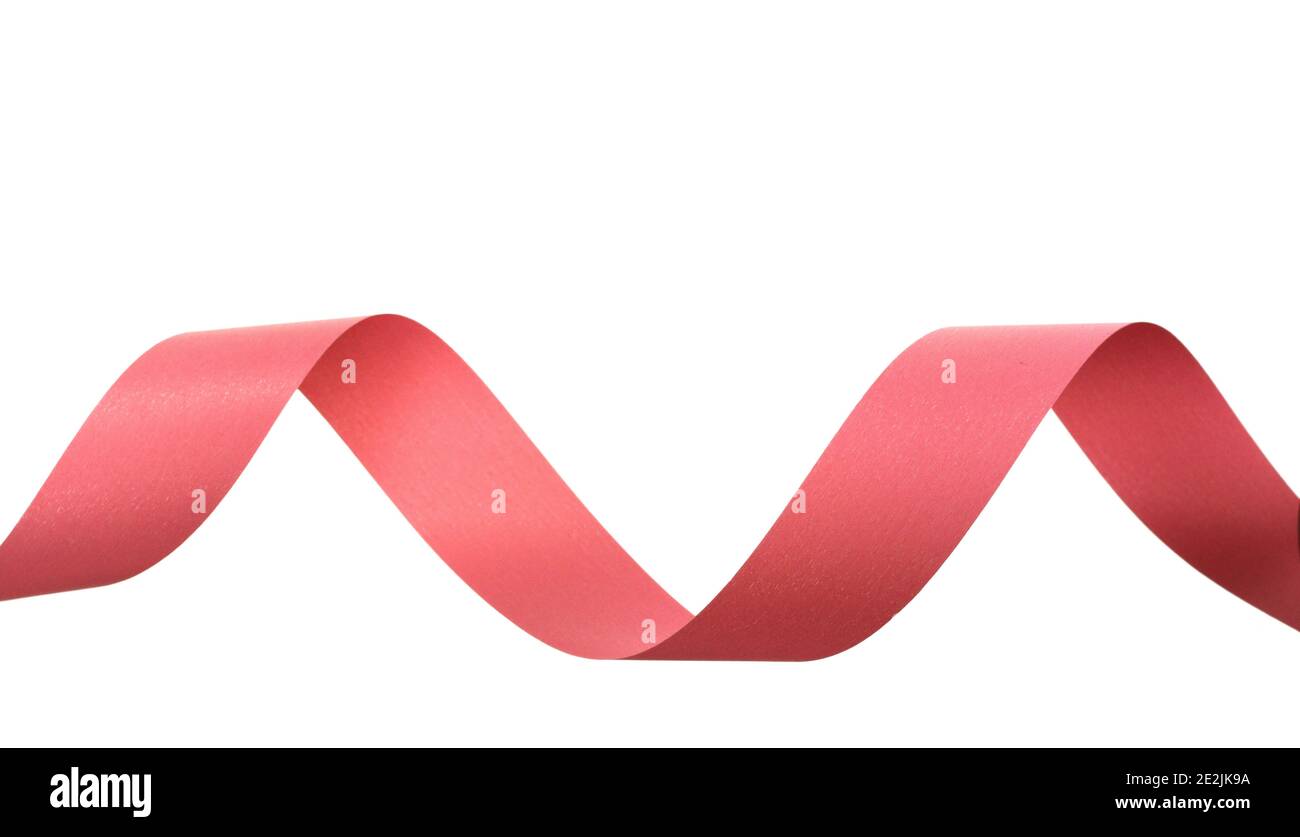 Red ribbon roll isolated on white background Stock Photo - Alamy
