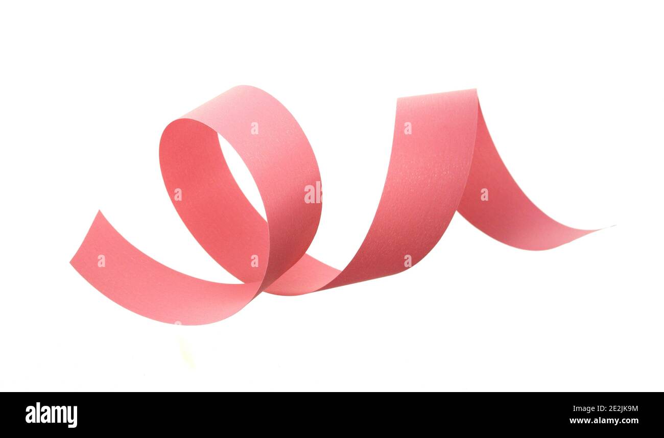Red ribbon roll isolated on white background Stock Photo - Alamy