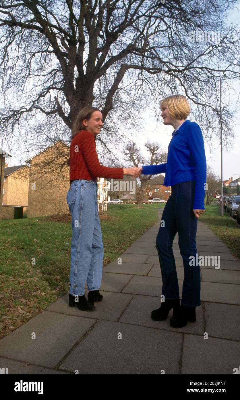 Teenage handshake hi-res stock photography and images - Alamy