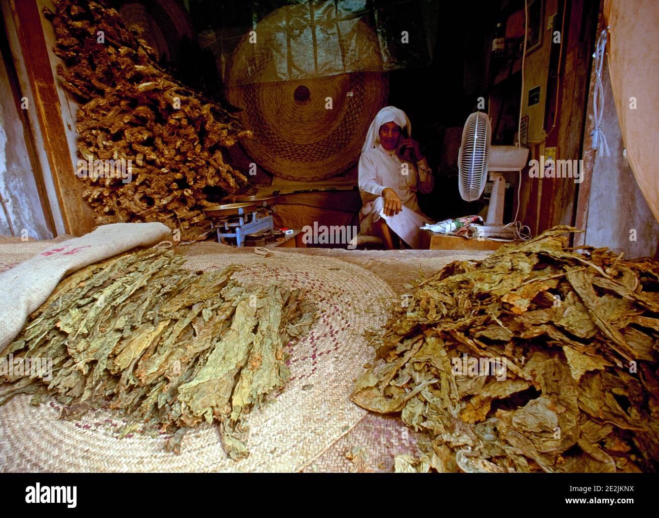 Manama Bahrain Man working in Tobacco Souk Stock Photo - Alamy