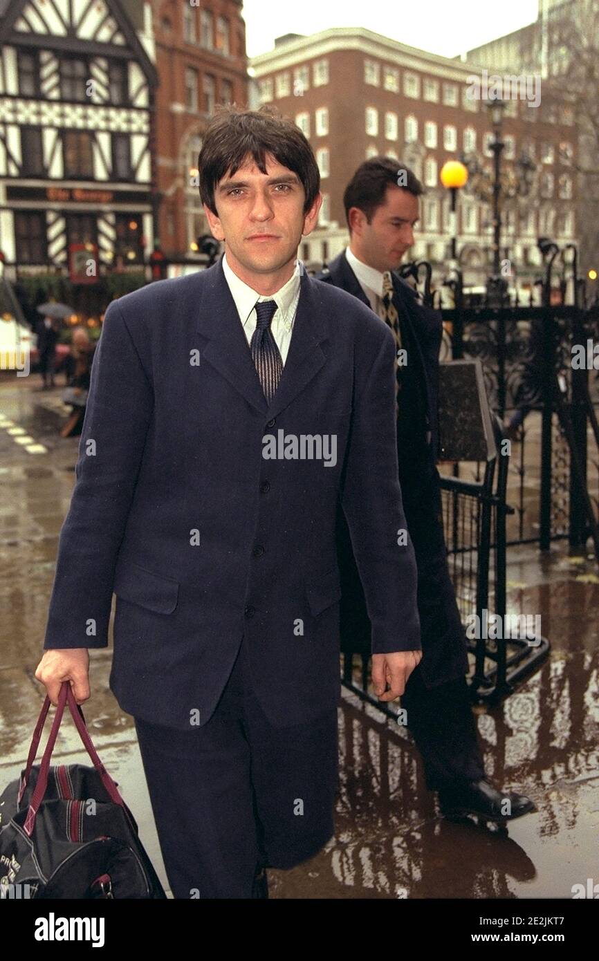 MIKE JOYCE, THE SMITHS ex-drummer, ARRIVING AT THE HIGH COURT INVOLVED ...