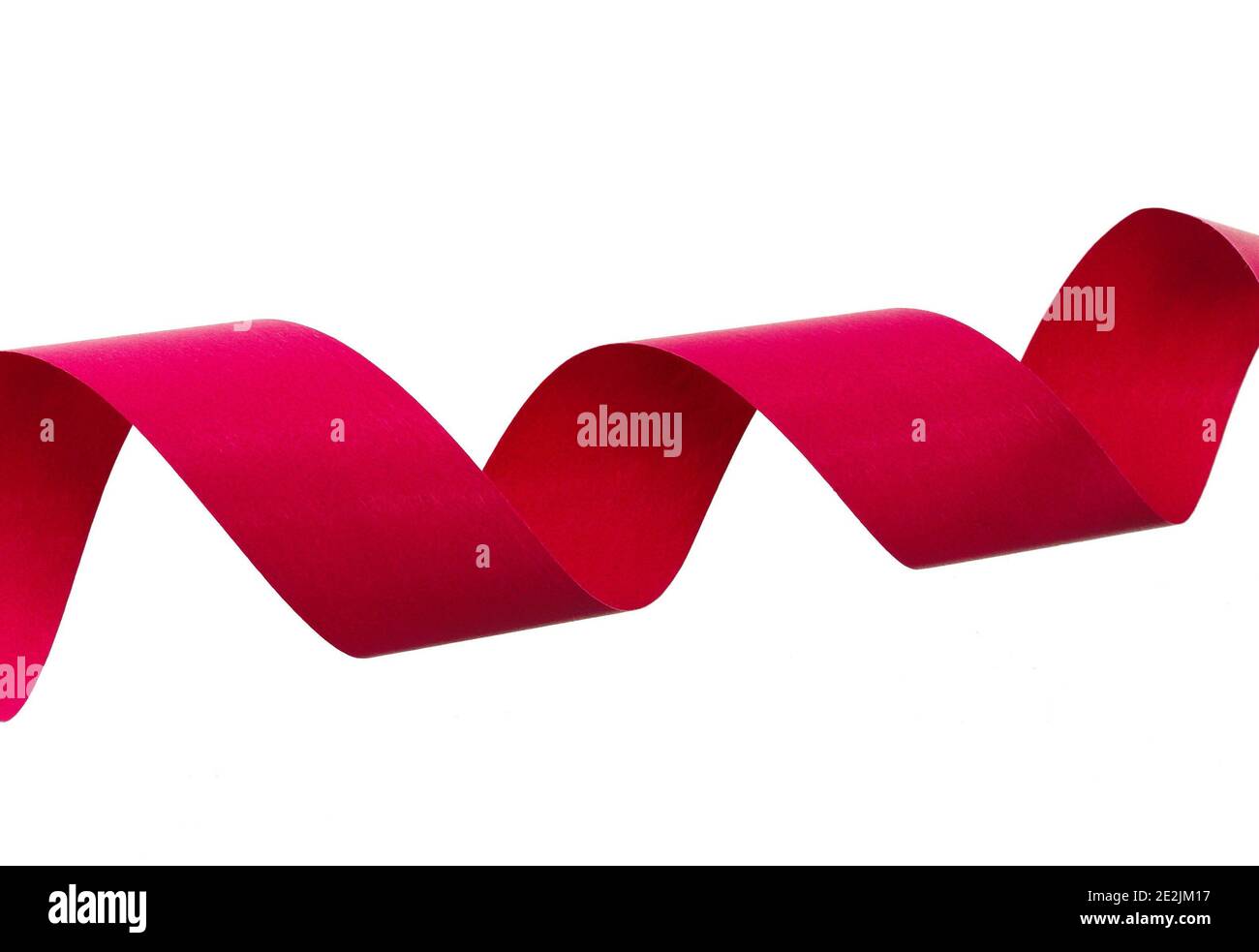 Red ribbon roll isolated on white background Stock Photo - Alamy
