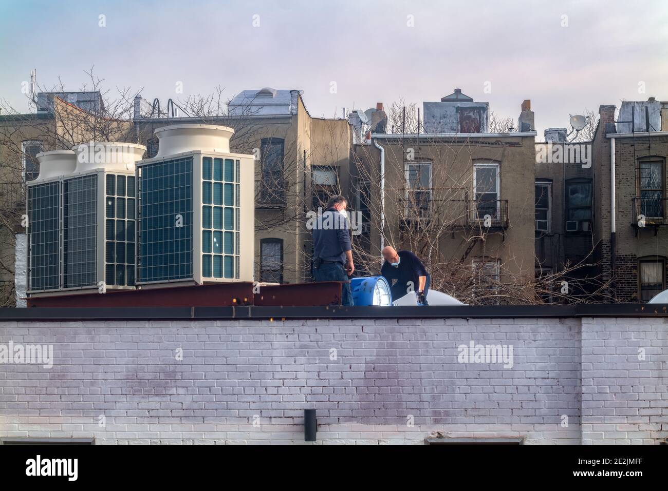 The grip and electric crew working on set of a film production in ...