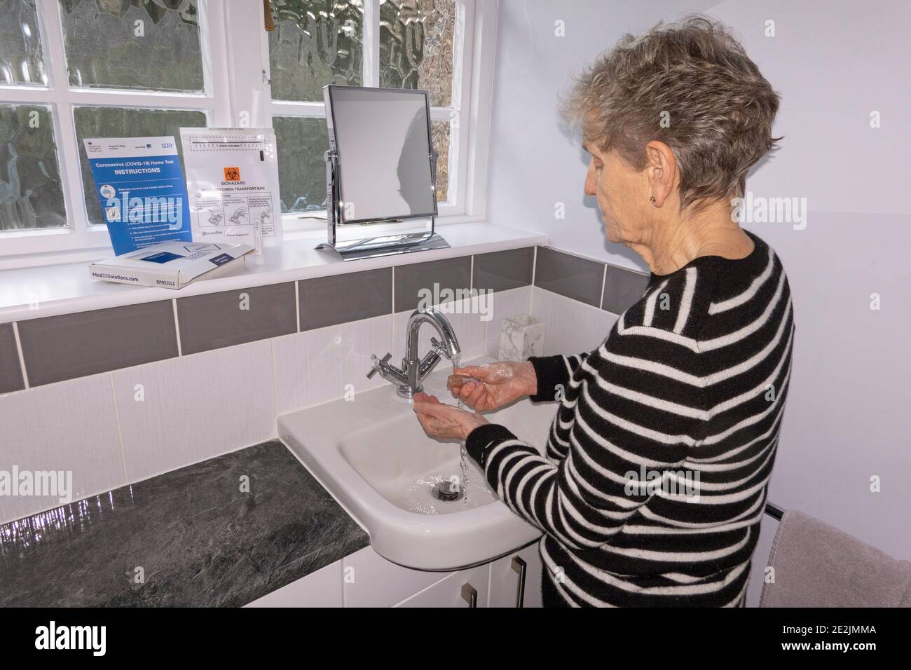 Hand washing elderly hi-res stock photography and images - Alamy